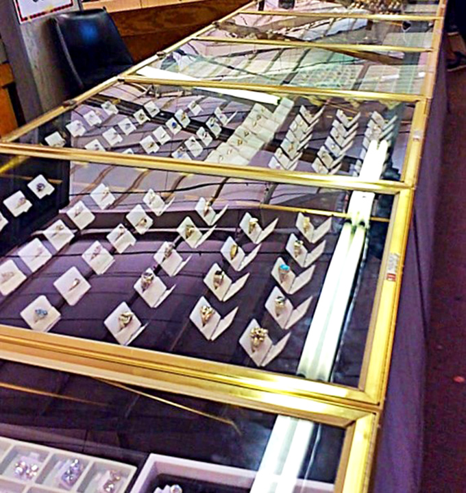 Jewelry displays glitter with possibility under glass&mdash;each tiny treasure waiting for its perfect match. Window shopping that sparkles.