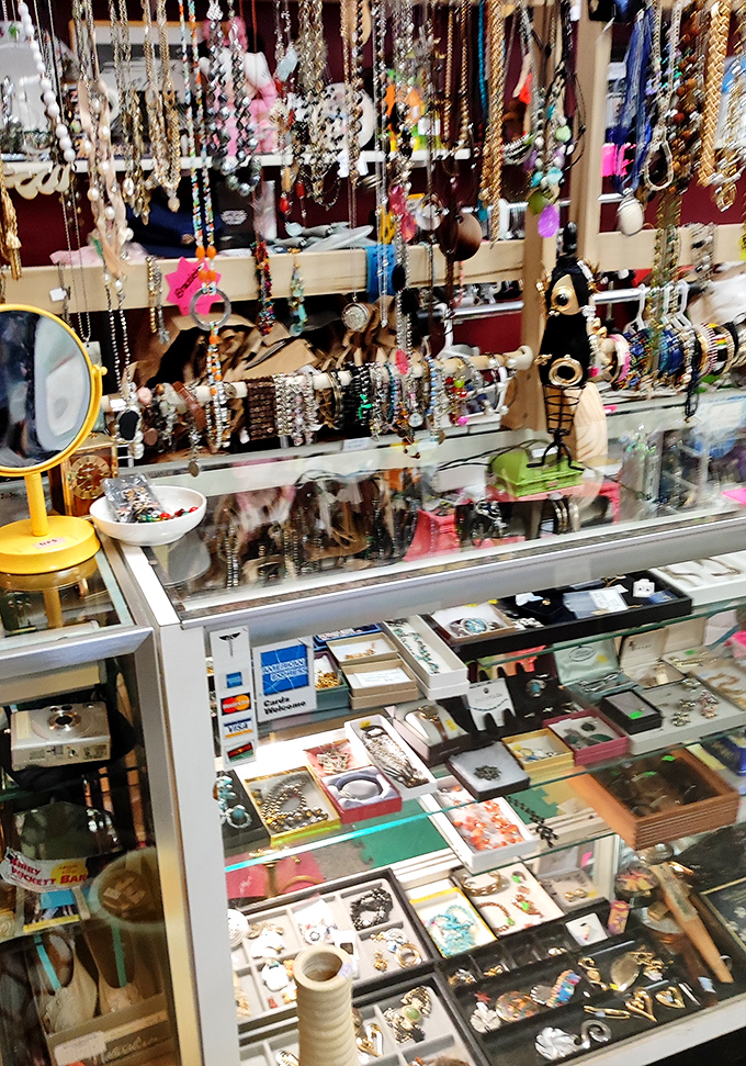 Jewelry heaven! Necklaces cascade like waterfalls of possibility, while below, boxed treasures await their next special occasion.