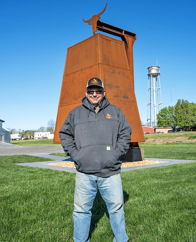 Nothing says "I found it" quite like standing triumphantly before Belle's most spectacular roadside treasure.