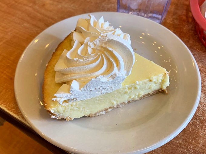 Key lime pie that strikes the perfect balance between tart and sweet. That pale yellow filling? That's how you know it's the real deal.