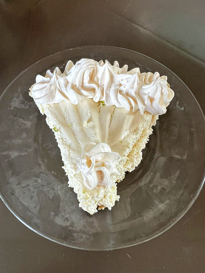 The legendary Key lime pie in all its glory &ndash; pale yellow perfection crowned with clouds of whipped cream. Worth every mile of the drive.