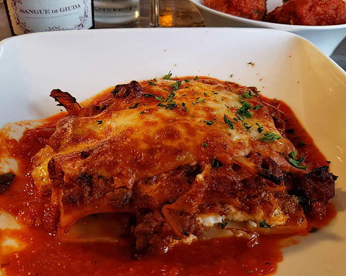 Behold the lasagna in all its glory &ndash; layers of pasta, sauce, and cheese performing a symphony that Mozart would have envied.
