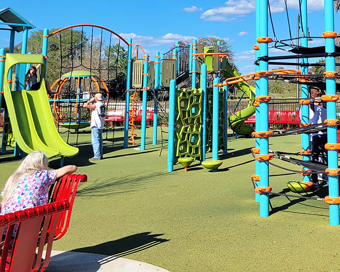 Colorful playground equipment that doesn't require a second mortgage to enjoy&mdash;where grandkids burn energy and grandparents catch their breath on thoughtfully placed benches.