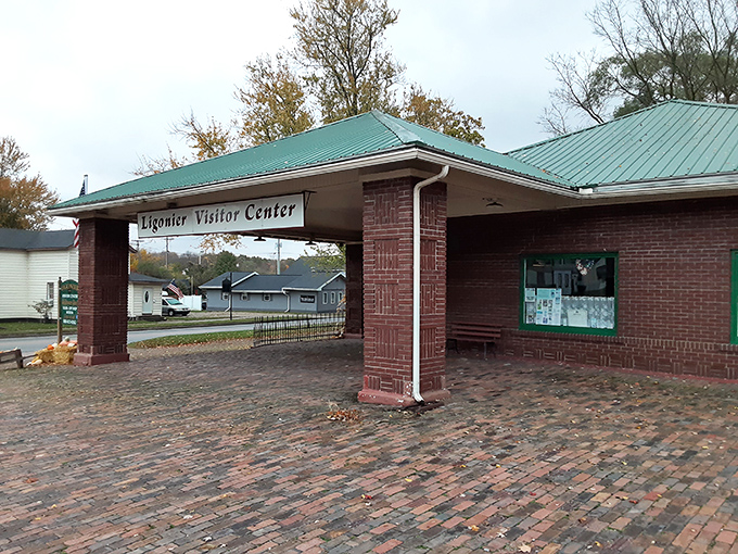 The Visitor Center welcomes travelers with brick-paved charm, proving small towns understand hospitality better than five-star hotels.