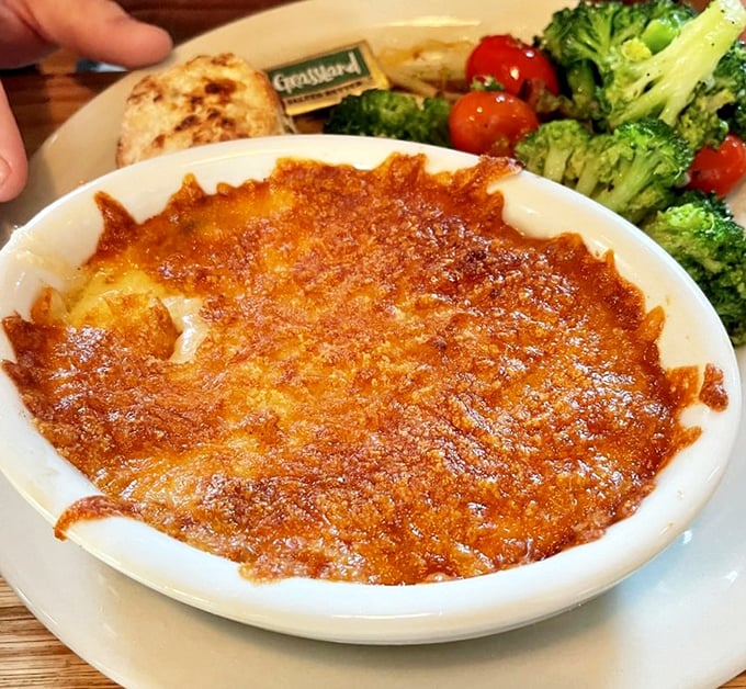 The mac and cheese that launched a thousand road trips. That golden-brown crust is the passport to cheese paradise.