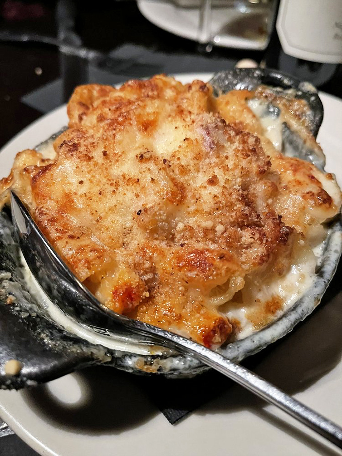 The lobster mac and cheese isn't just comfort food&mdash;it's therapy in a dish, with cheese sauce so rich it should have its own tax bracket.