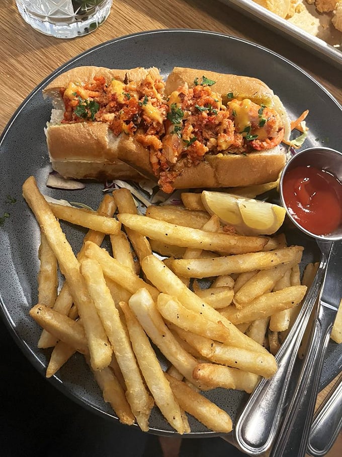 Behold the lobster roll that launched a thousand return visits &ndash; generous, buttery, and absolutely magnificent.