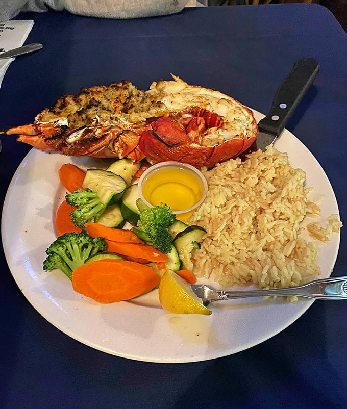 Split lobster served with the respect it deserves&mdash;simply prepared to let its natural sweetness shine. That drawn butter? Liquid gold for dipping.