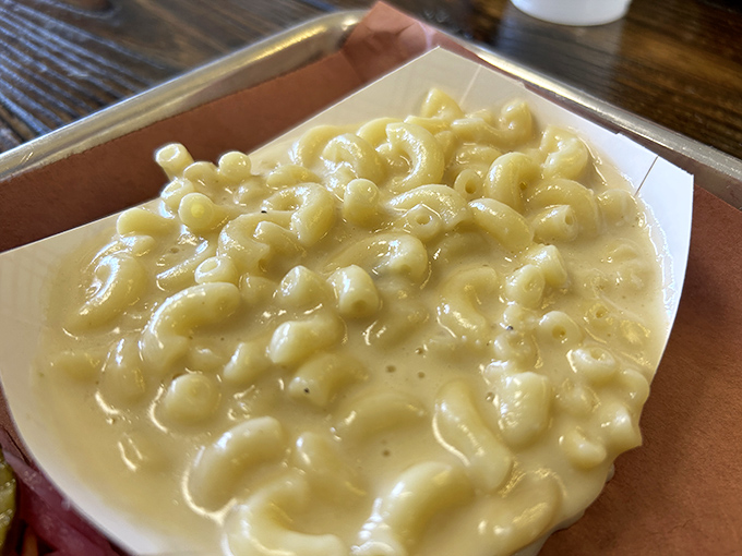 This mac and cheese isn't just comfort food&mdash;it's therapy in a paper boat. Creamy, cheesy perfection that makes grown adults weak in the knees.