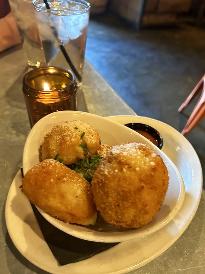 These golden-fried mac and cheese balls aren't just appetizers&mdash;they're life-changing spheres of happiness that demand your immediate attention.