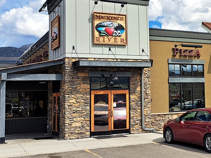 MacKenzie River Pizza serves up Montana comfort with a view&mdash;where the hearty stone exterior promises meals as substantial as the surrounding landscape.