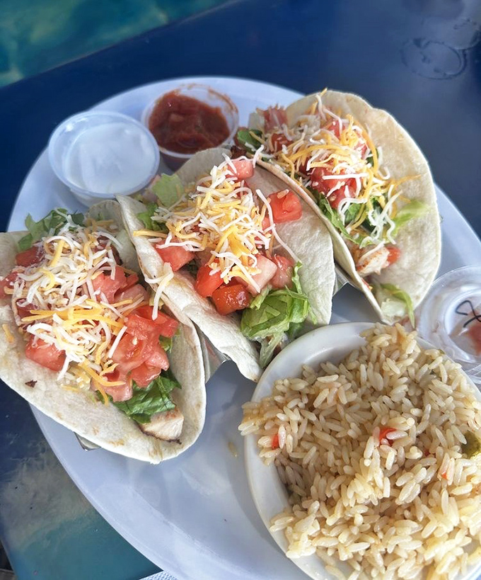 These fish tacos aren't just lunch—they're a vacation on a plate, complete with seasoned rice as your tropical sidekick.