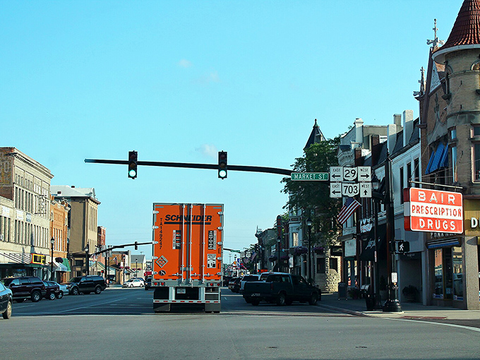 Main Street traffic jams in Celina mean waiting for two cars instead of two hours. The prescription drugs sign reminds us this is indeed a retirement-friendly town.