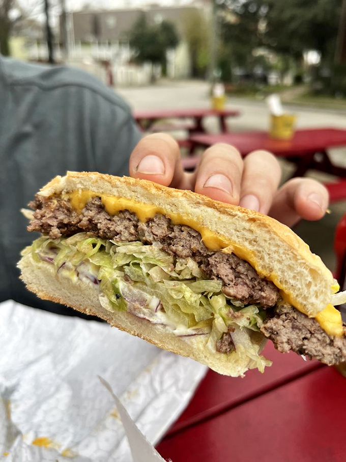 This burger requires a game plan, two hands, and possibly a signed waiver from your cardiologist.