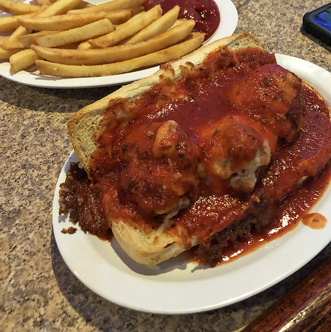 Behold the legendary meatball sub – a magnificent mess of meat, cheese, and sauce that'll ruin you for others.