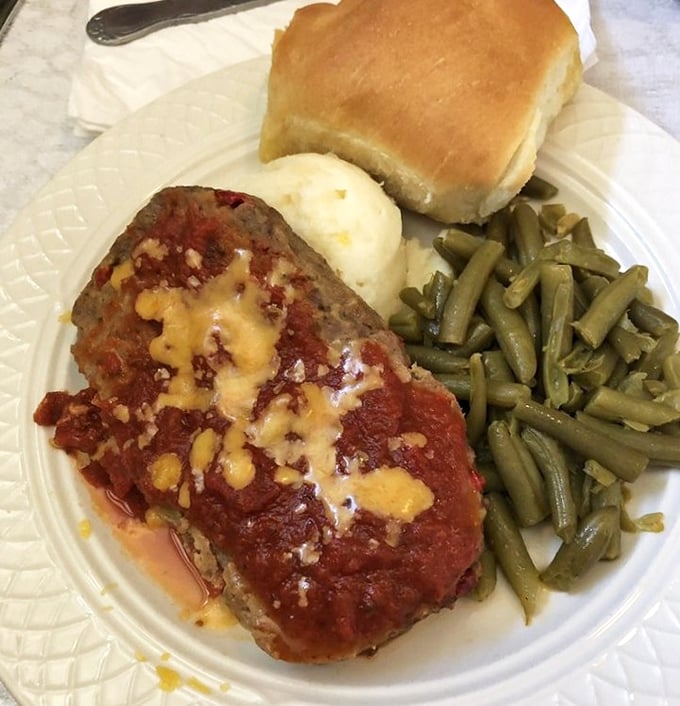 Behold the star attraction: meatloaf that would make your grandmother simultaneously proud and jealous. That tomato glaze is practically glistening with flavor.