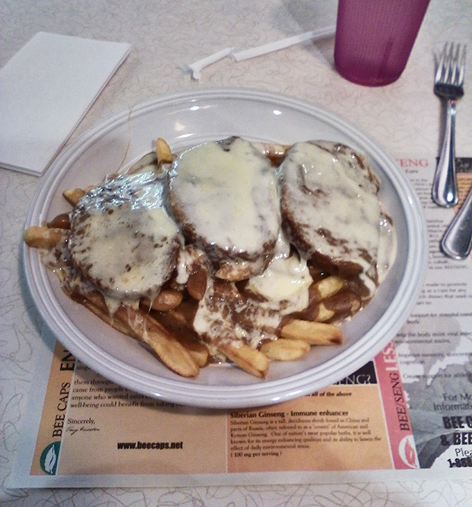 Comfort food doesn't get more serious than this&mdash;meatloaf smothered in gravy atop a mountain of fries. Grandma would approve, then ask for the recipe.