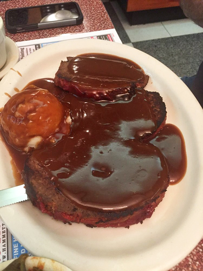 This isn't just meatloaf&mdash;it's a brown gravy-bathed monument to comfort food, the kind that makes you want to call your mother and thank her.