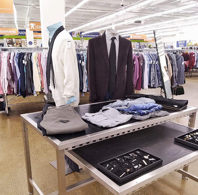 Men's formal wear displayed with unexpected elegance &ndash; because nothing says "I'm fiscally responsible" like a designer suit at one-tenth the original price.