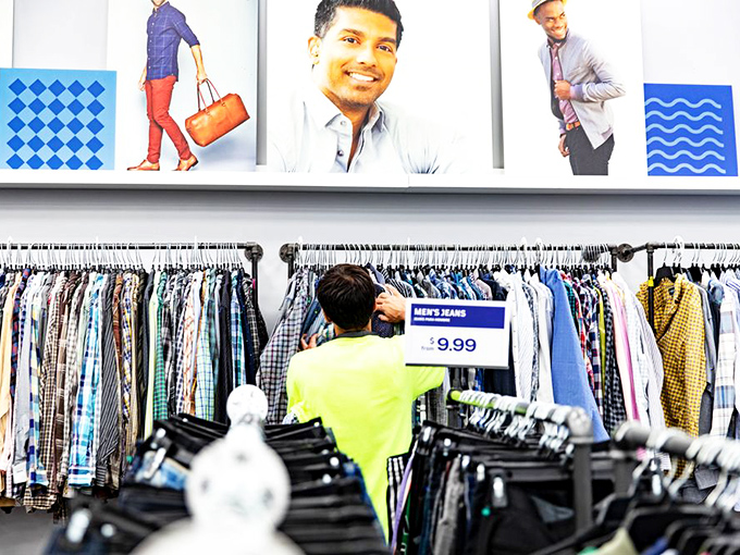 Men's jeans for $9.99? In this economy? The rack displays showcase some of the more premium items separated from the by-the-pound bins.