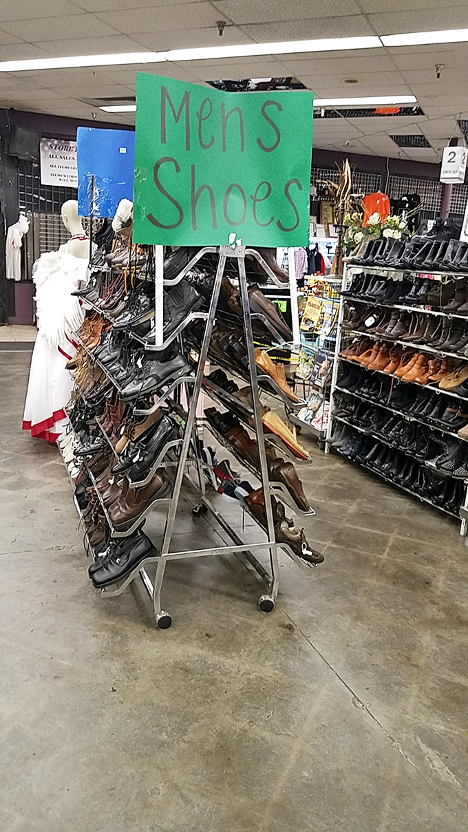 The men's shoe section: where cowboy boots meet dress shoes in a footwear reunion spanning decades of style choices, both questionable and inspired.