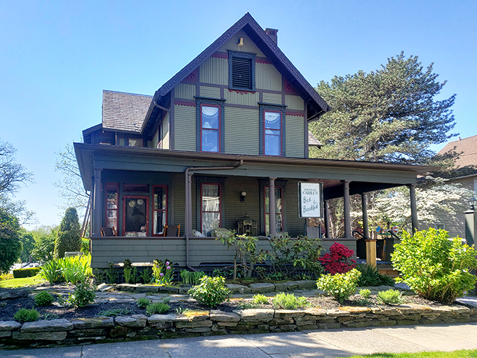 Victorian charm wraps around this welcoming porch where you can practically hear the rocking chairs calling your name for sunset sitting.