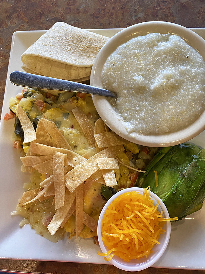 The legendary Migas Skillet that launched a thousand road trips—crispy tortilla strips, fluffy eggs, and melty cheese create breakfast nirvana worth driving for.