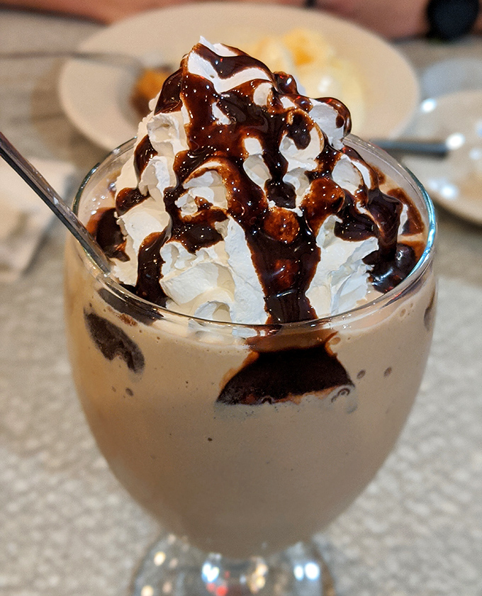 This isn't just a milkshake&mdash;it's a chocolate masterpiece topped with real whipped cream and hot fudge that would make Willy Wonka himself weep with joy.