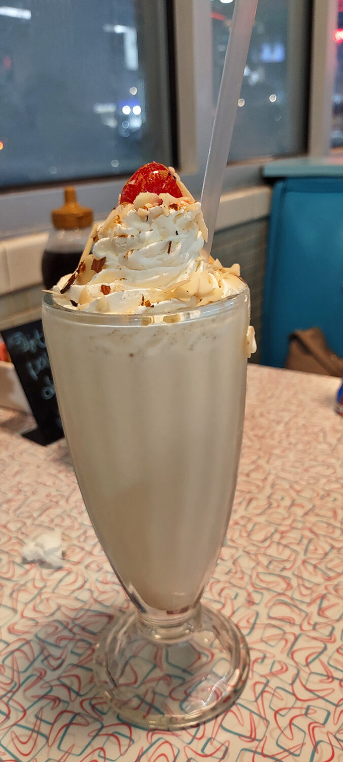 Behold the milkshake that launched a thousand road trips &ndash; topped with enough whipped cream to hide your smile.