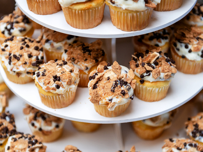 These aren't just muffins; they're edible architecture topped with a crumbly masterpiece that would make Michelangelo weep with joy.