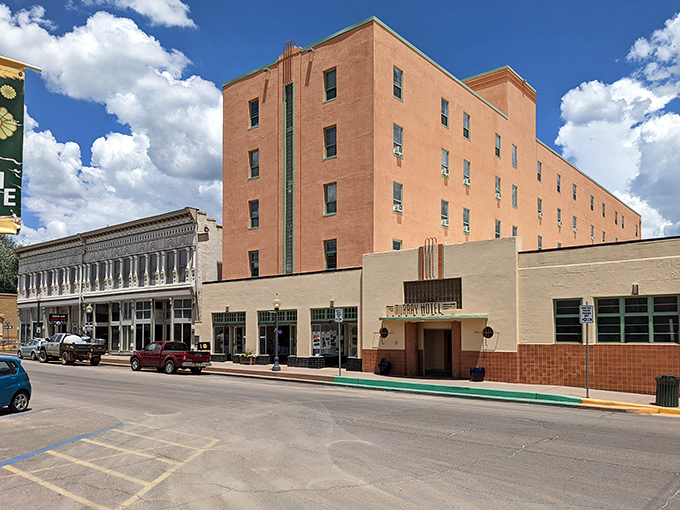 The Murray Hotel towers over Bullard Street, offering accommodations that remember when "hospitality" meant something more than wifi passwords.