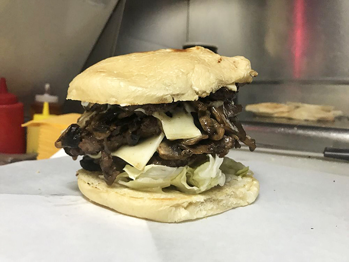 The Mushroom Burger: where earthy umami meets melty cheese in a relationship that makes more sense than most Hollywood marriages.