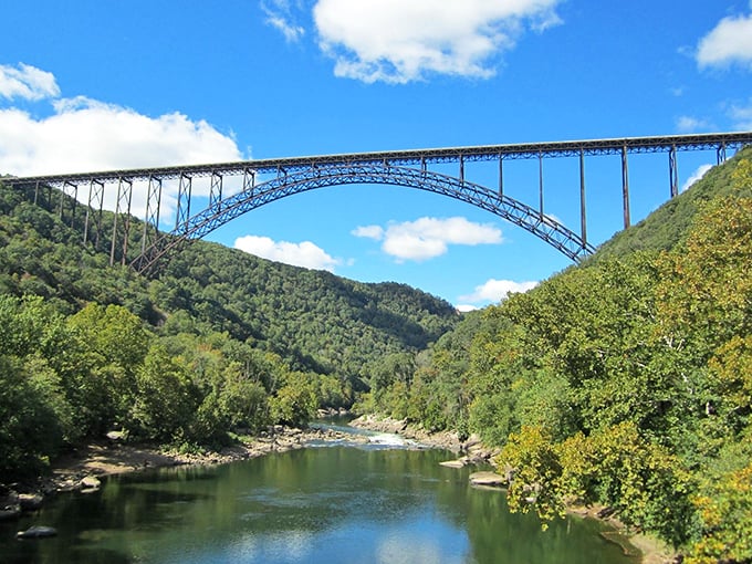Engineering marvel meets natural wonder at the New River Gorge Bridge, where man and mountain reached a spectacular compromise 876 feet above the water.