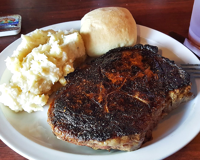 This New York Strip isn't just cooked&mdash;it's been transformed into a carnivore's dream, complete with that perfect char that whispers, "Yes, this is exactly what you've been craving."