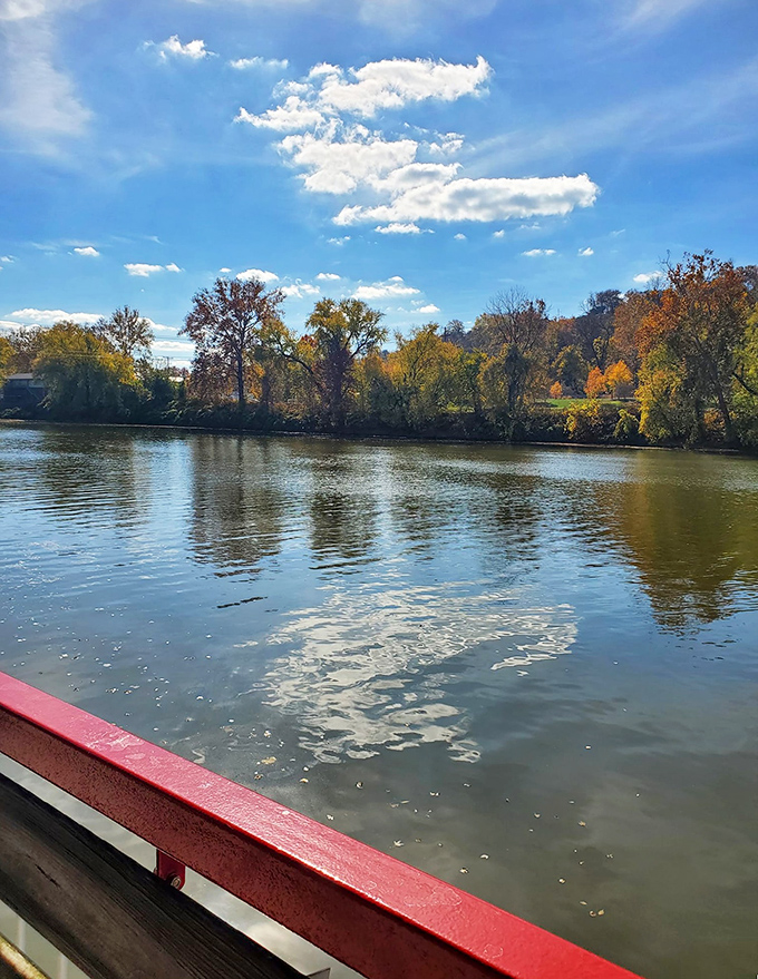 The Muskingum River reflects autumn's golden light, offering a tranquil moment that feels worlds away from the hustle of everyday life.