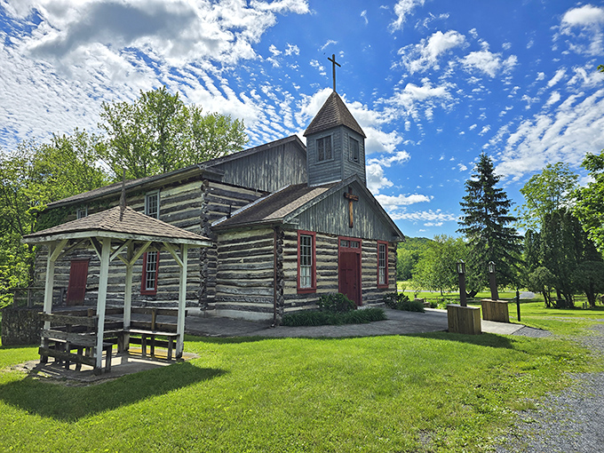 This rustic log church at Old Bedford Village whispers stories of frontier faith, where Sunday best meant your cleanest homespun and sturdiest boots.