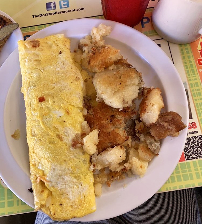 This omelet doesn't just whisper "good morning"&mdash;it belts out a Broadway-worthy breakfast anthem with perfectly crispy home fries as backup singers.