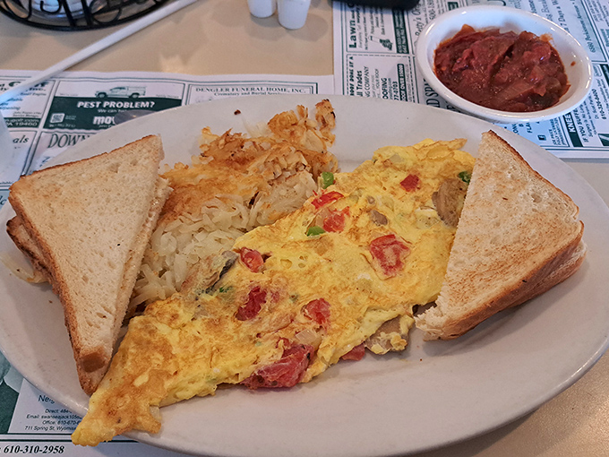 This omelet could double as a throw pillow &ndash; fluffy, generous, and stuffed with enough goodness to fuel your entire day.