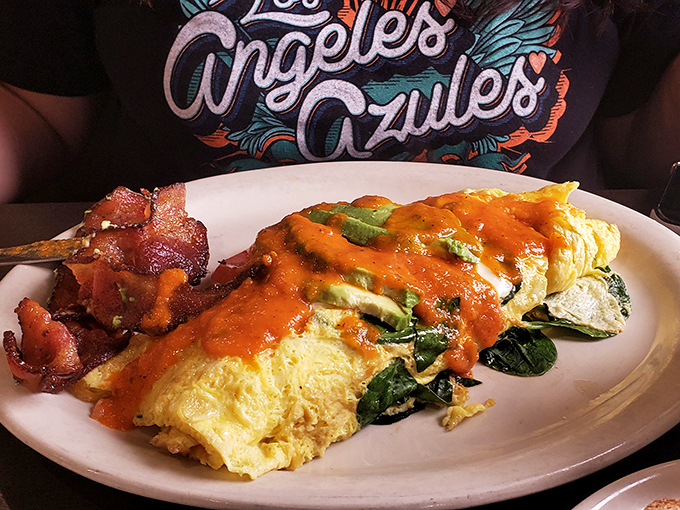 This isn't just an omelet&mdash;it's a golden envelope stuffed with a love letter to cheese, avocado, and perfectly cooked eggs.