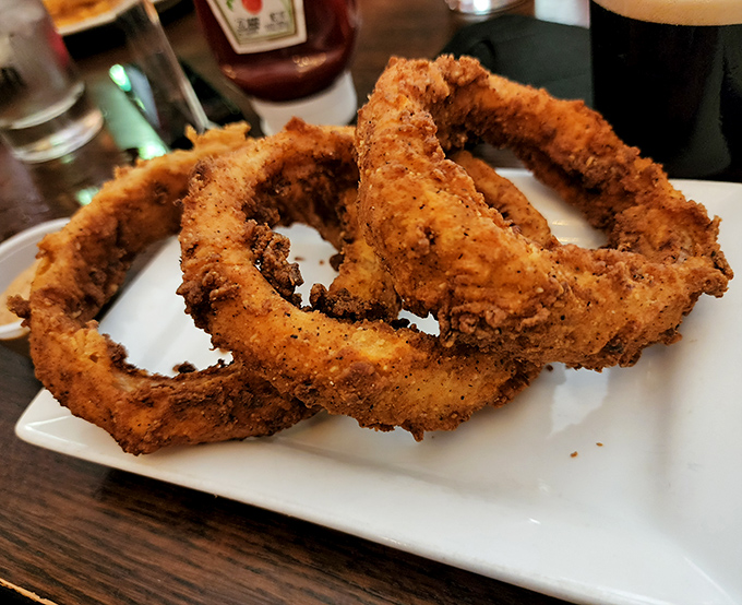Golden halos of perfection that make other onion rings seem like sad, distant relatives. These crispy beauties might just be worth crossing state lines for.