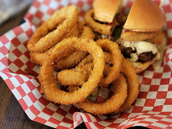 Golden onion rings stacked like edible Olympic rings&mdash;crispy, savory hoops of happiness that make french fries jealous of the attention.