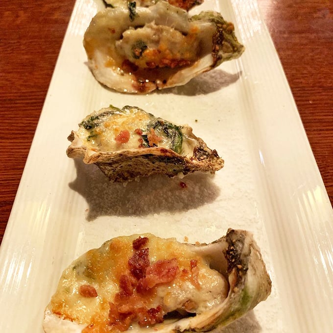 Oysters Rockefeller that would make the Vanderbilts jealous. These briny beauties, topped with spinach, bacon, and cheese, are what seafood dreams are made of.