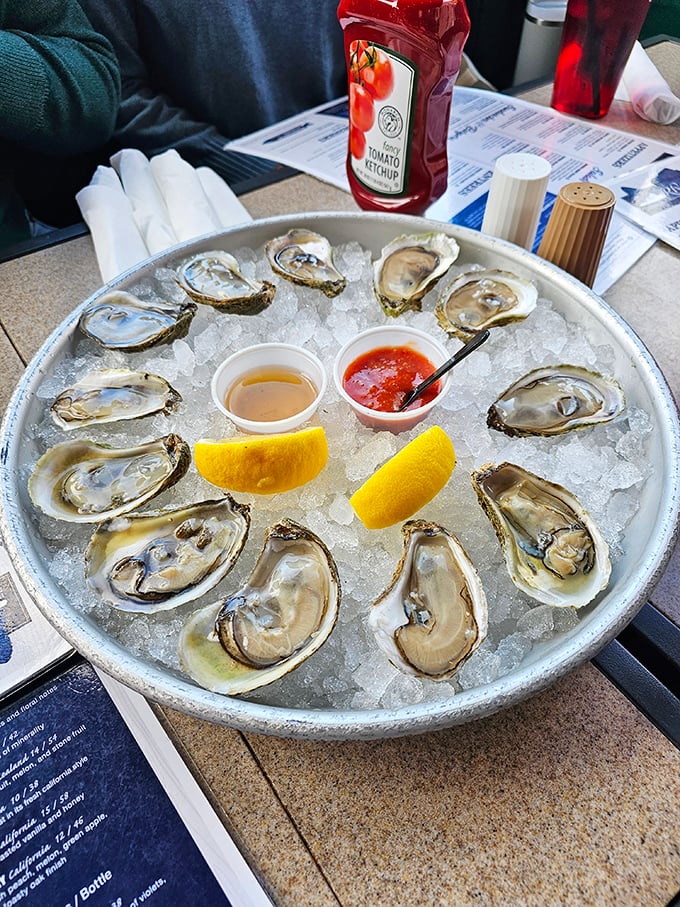 A dozen glistening oysters arranged like a briny clock face. The only time that matters here is freshness o'clock.