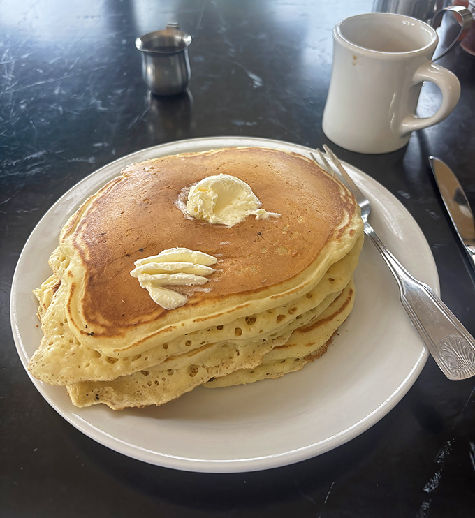 These aren't those sad, flat pancakes that merely transport syrup to your mouth&mdash;they're fluffy golden masterpieces with perfect butter-melting pockets.