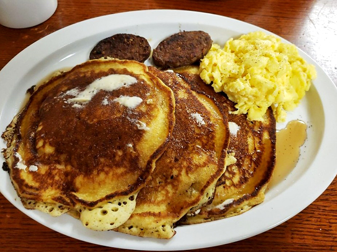 Golden-brown pancake perfection with a side of possibility. These fluffy discs have launched a thousand road trips across South Carolina.