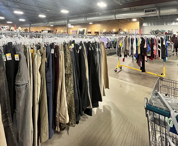 The pants section stretches toward the horizon like a denim rainbow. Your perfect pair is hiding here somewhere, probably next to someone else's fashion regret.