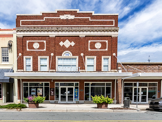 The Paramount Theater's brick facade and ornate details transport visitors to a time when going to the movies was an event worth dressing up for.