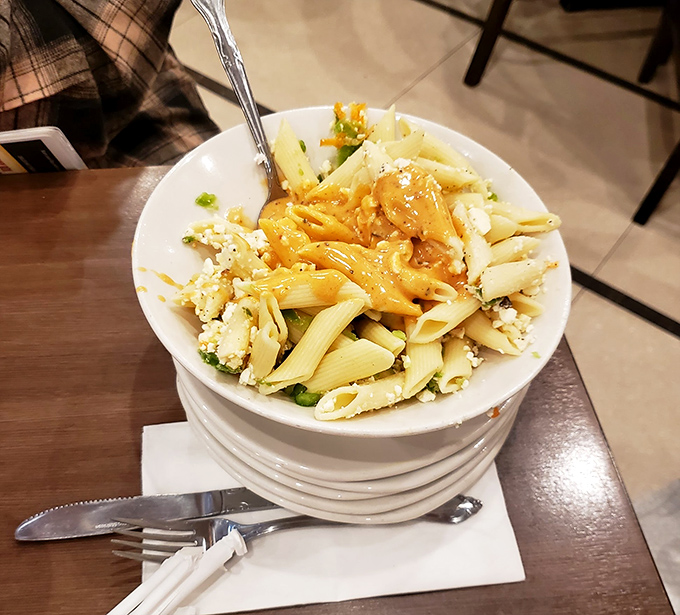 The legendary pasta salad in all its glory. Perfectly al dente penne, creamy dressing, and a sprinkle of cheese that makes you question all other pasta salads.