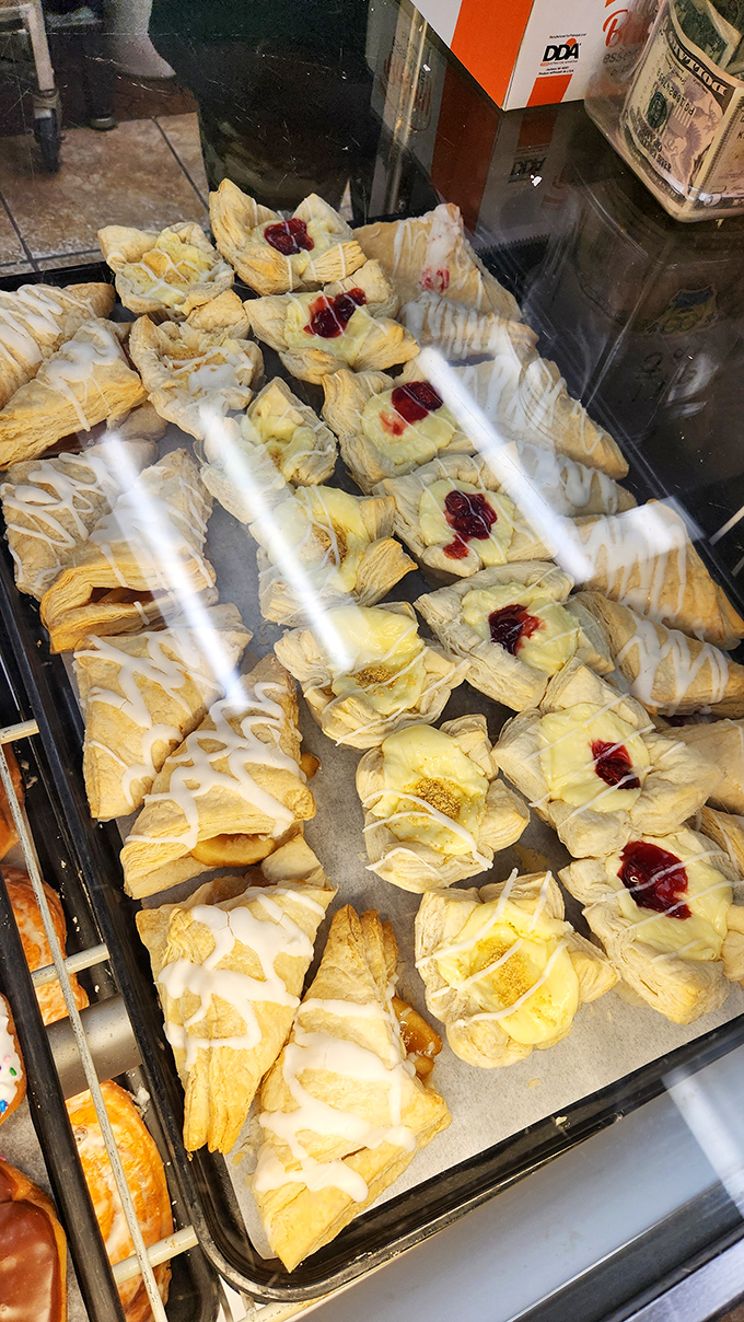 Flaky pastries with fruit centers and drizzled icing wait patiently in the case, like edible jewelry too beautiful to eat&mdash;but you will anyway.