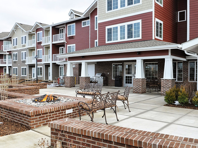 The outdoor patio area strikes that perfect balance between elegance and comfort, with a crackling fire pit that practically begs for marshmallows and conversation.